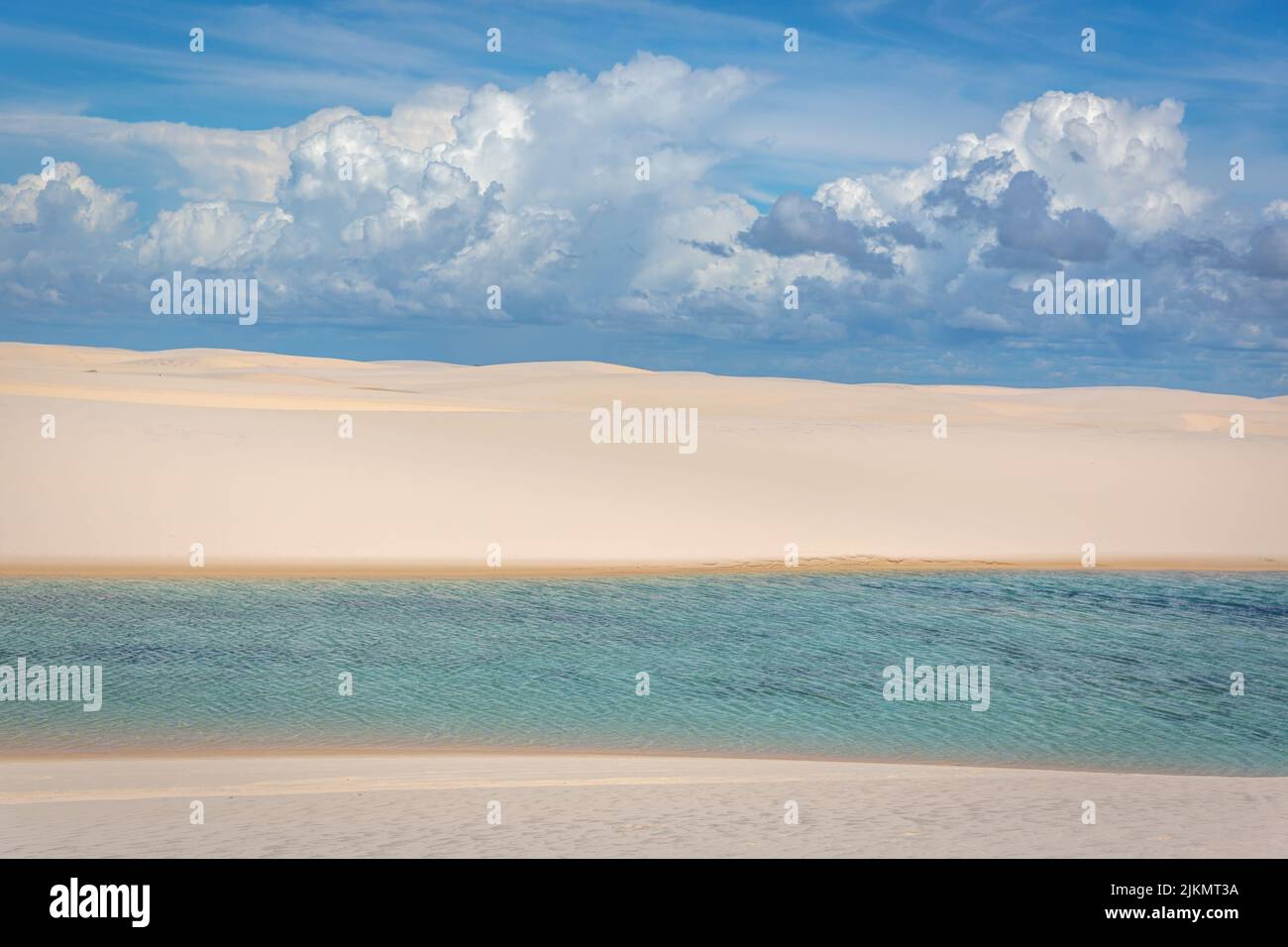 Amazing blue fresh water lagoon with sand dunes in northern of Brazil ...