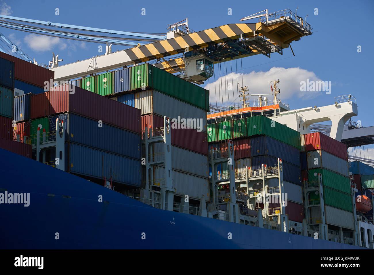 Container ship in port at container terminal. Ships of container ships stand in terminal of port ...