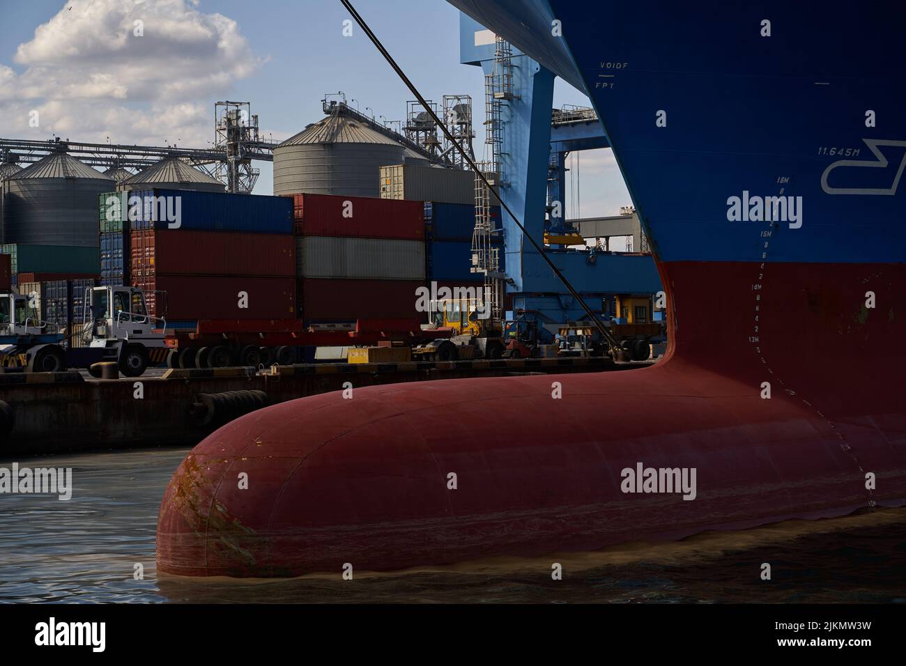 Container ship in port at container terminal. Ships of container ships ...