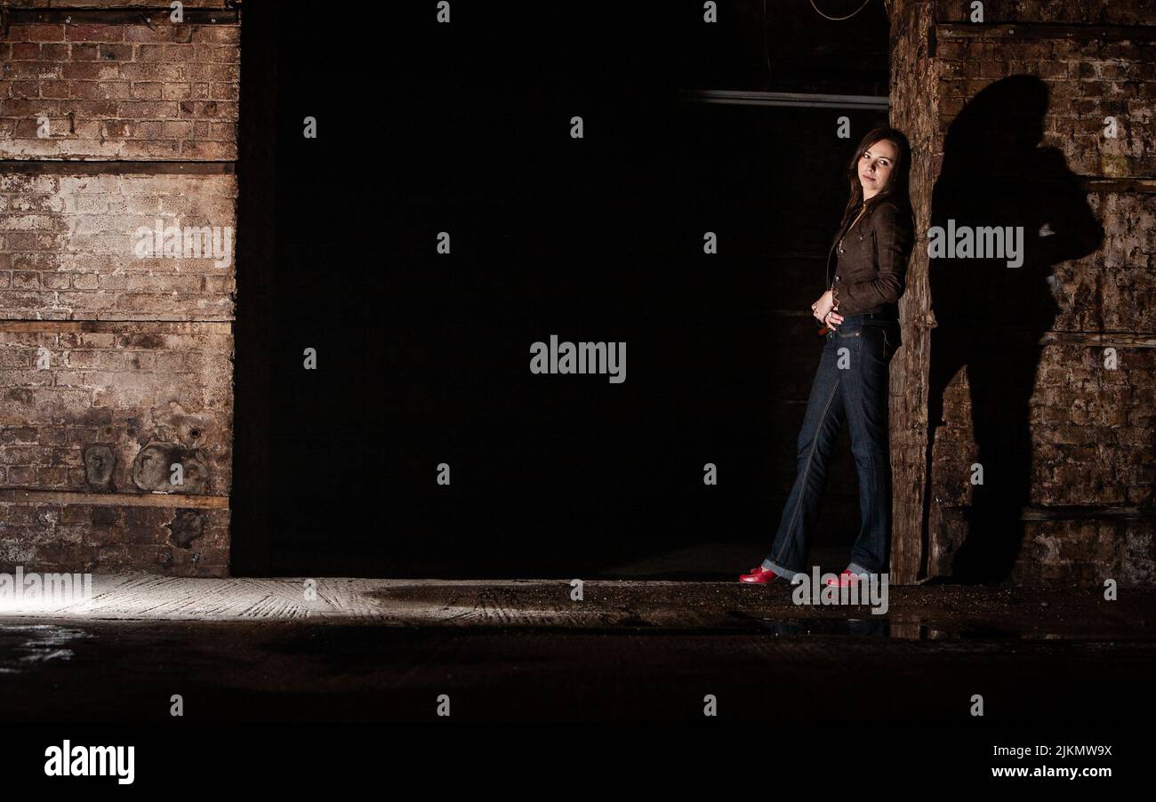 Urban Nights; waiting. A strong stance from a confident female model ...