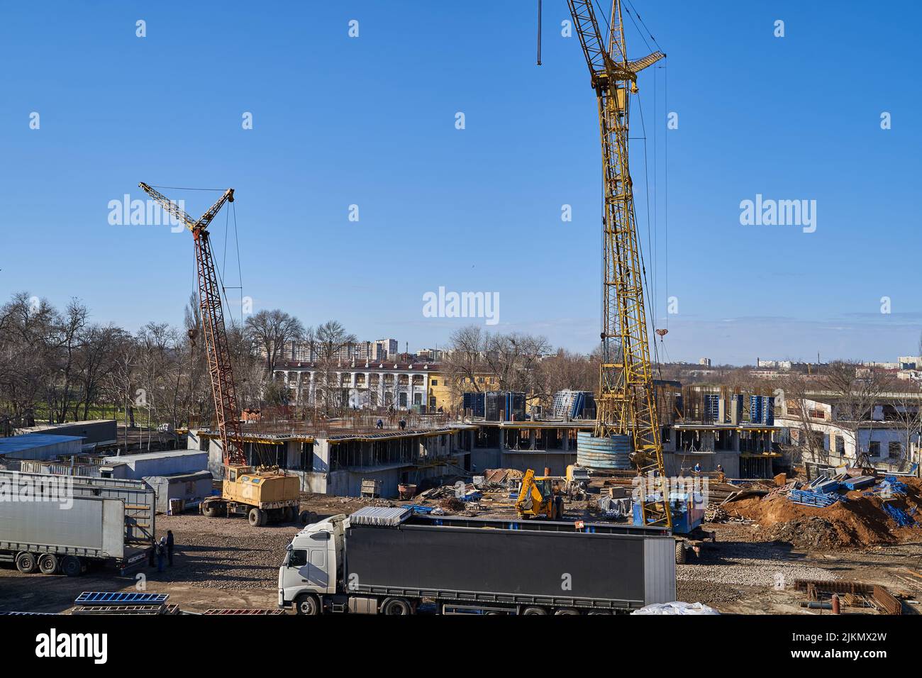 Construction site. High rise Building under construction. Construction ...