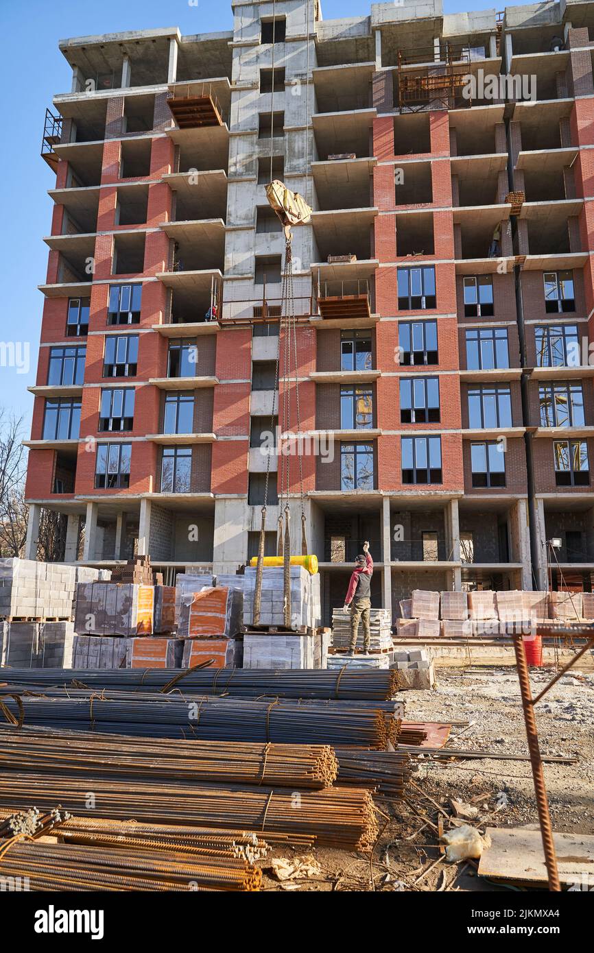 Construction site. High rise Building under construction. Construction ...