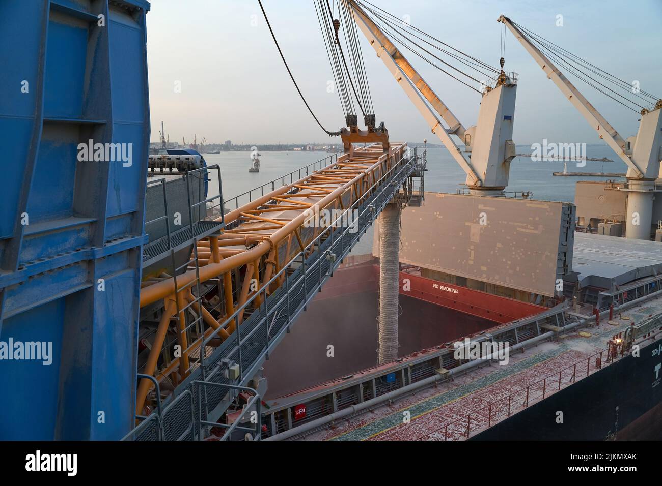Port grain elevator. Industrial sea trading port bulk cargo zone grain ...