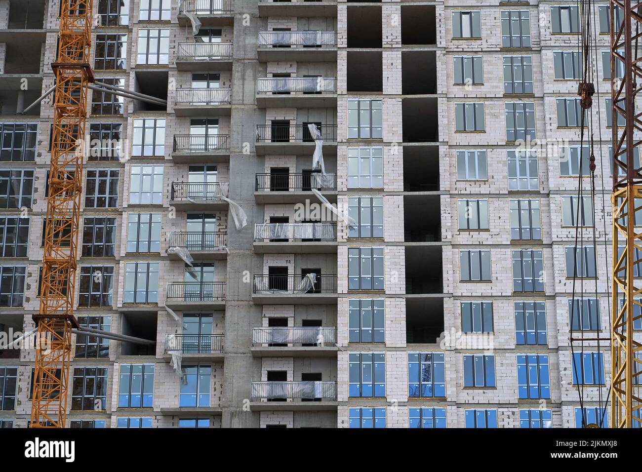 Construction site. High rise Building under construction. Construction ...