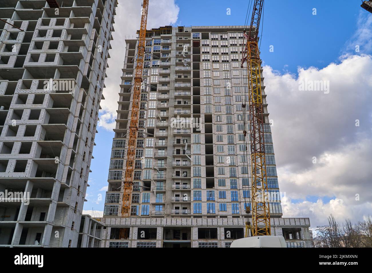 Construction site. High rise Building under construction. Construction ...