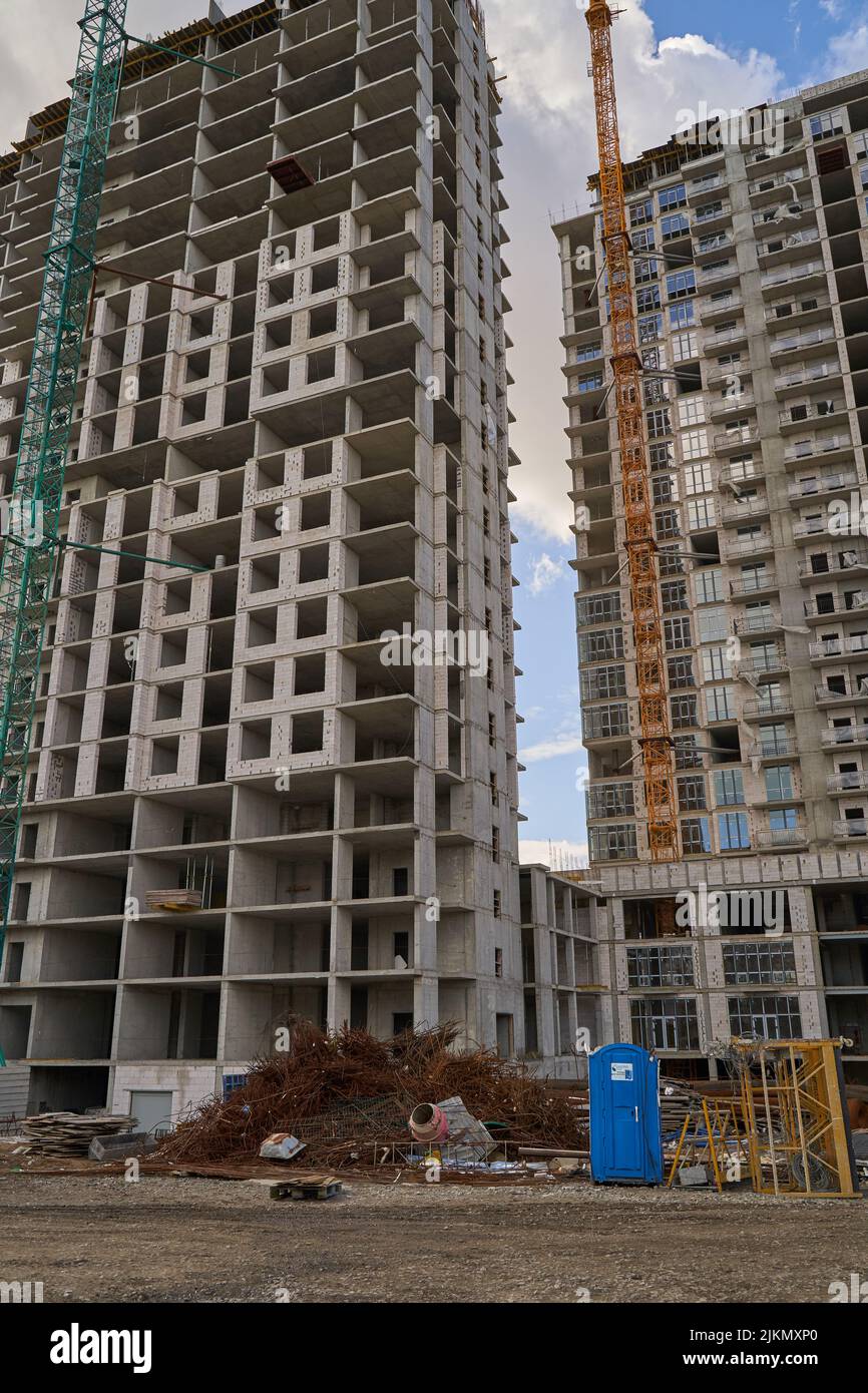 Construction site. High rise Building under construction. Construction ...