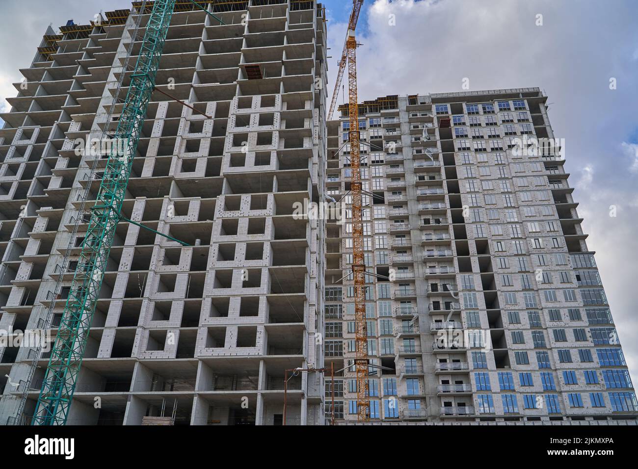 Construction site. High rise Building under construction. Construction ...