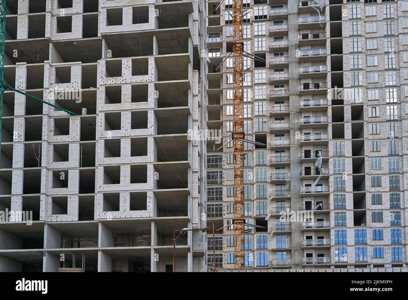 Construction site. High rise Building under construction. Construction ...