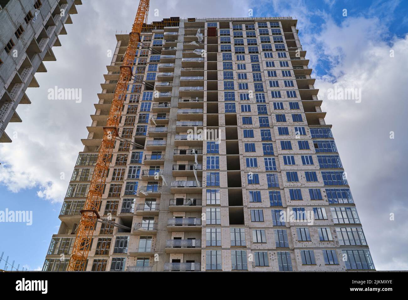 Construction site. High rise Building under construction. Construction ...