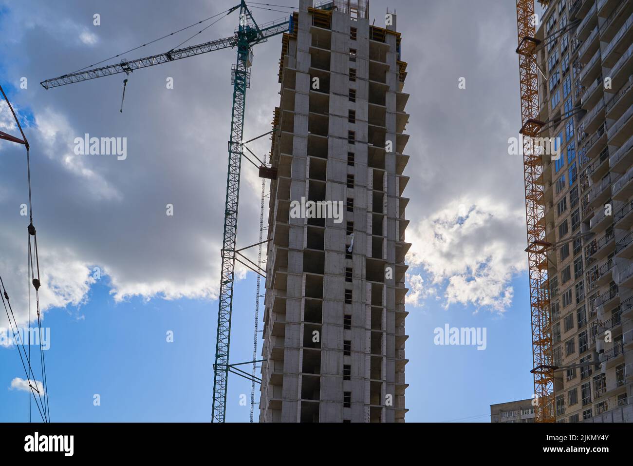 Construction site. High rise Building under construction. Construction ...