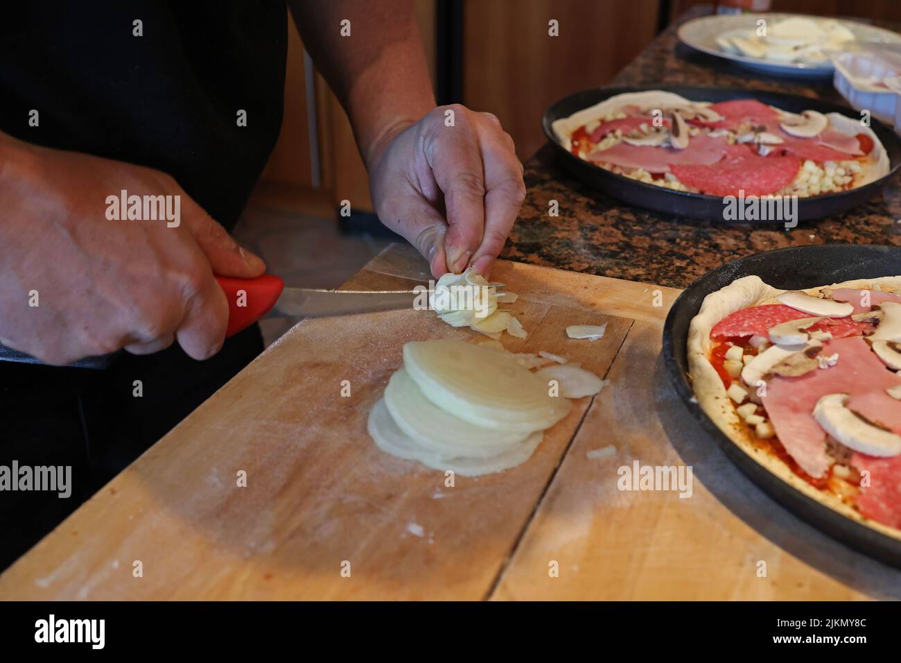 Bake original Italian pizza at home - Traditional preparation Stock ...