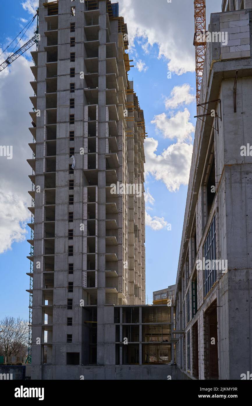 Construction site. High rise Building under construction. Construction ...