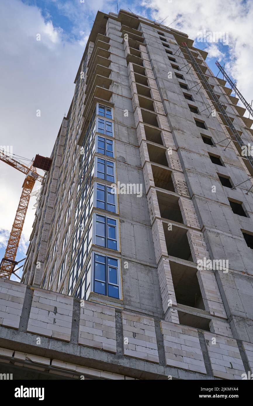 Construction site. High rise Building under construction. Construction ...