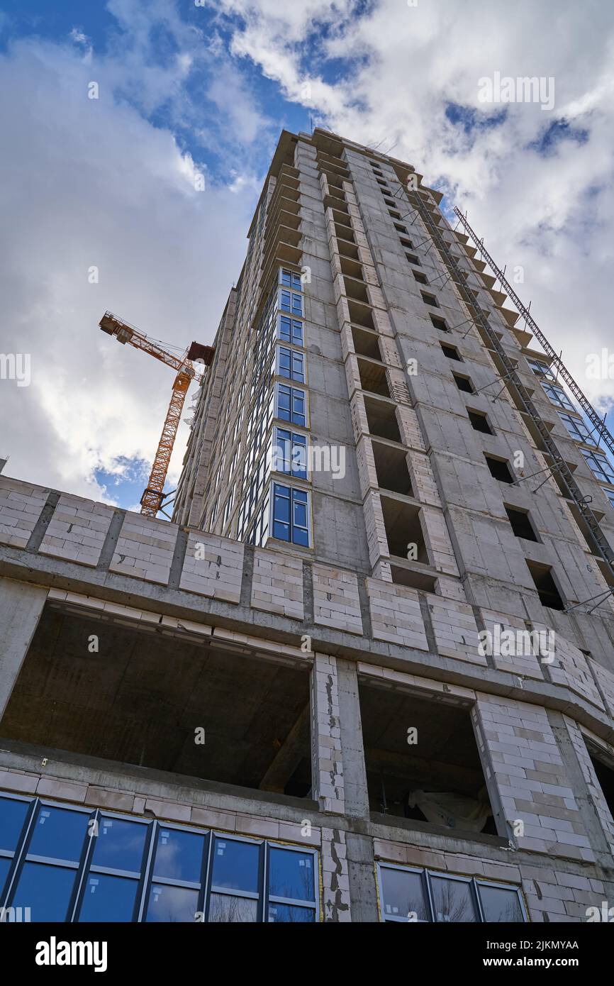 Construction site. High rise Building under construction. Construction ...