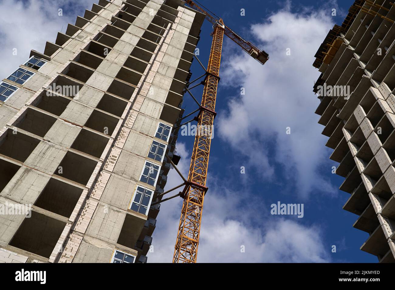 Construction site. High rise Building under construction. Construction ...