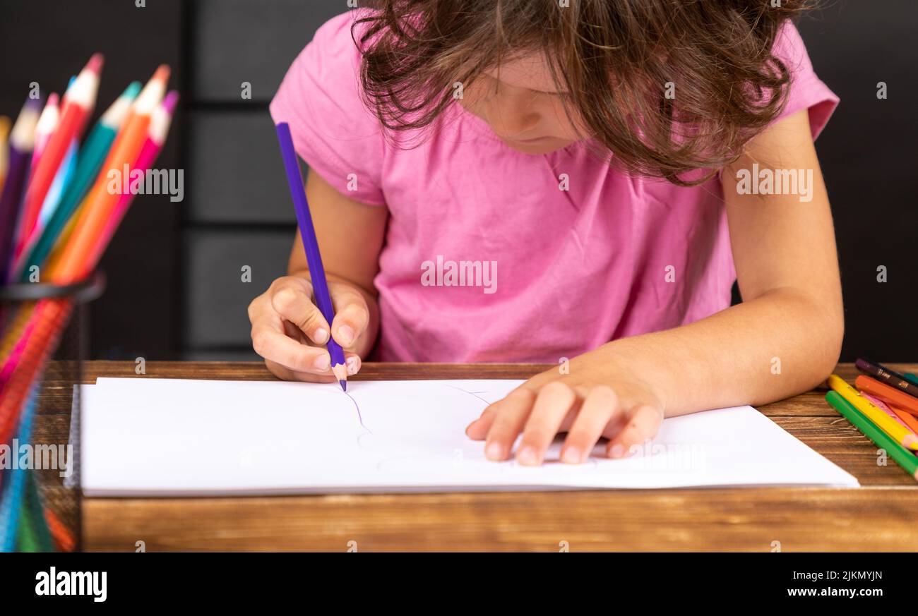 drawing child on wooden desk Stock Photo - Alamy