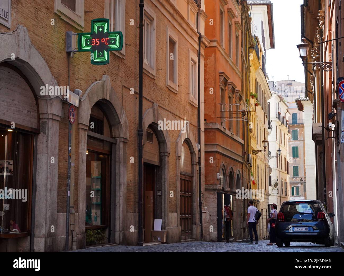 Rome, Italy. 2nd Aug, 2022. A sign reads the temperature at 35 degrees ...