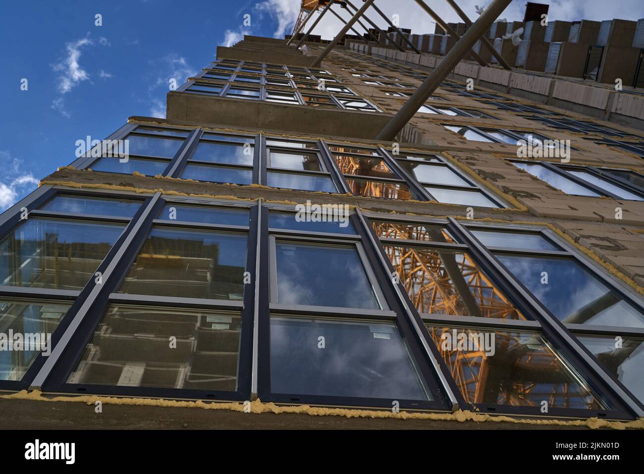 Construction site. High rise Building under construction. Construction ...