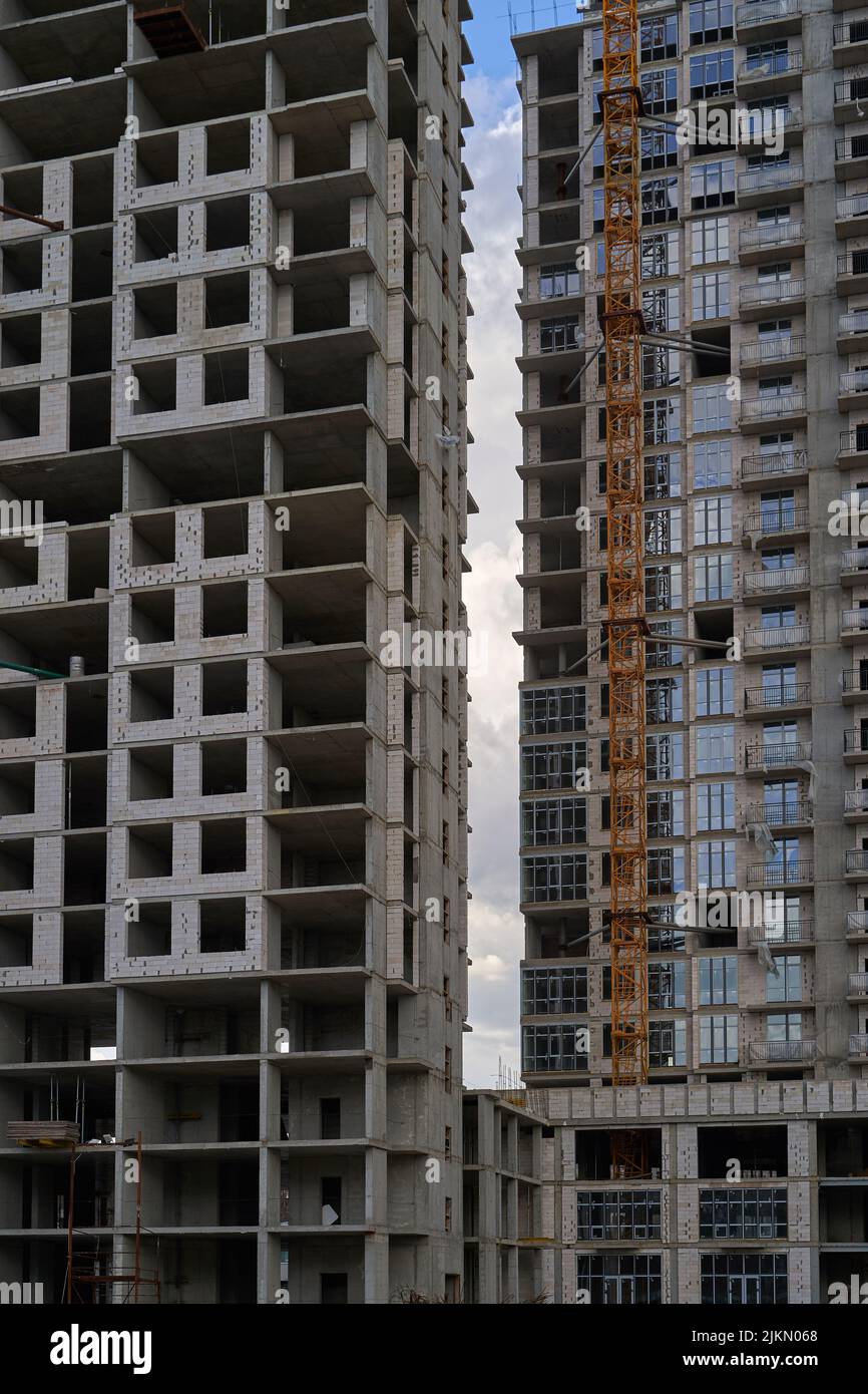 Construction site. High rise Building under construction. Construction ...