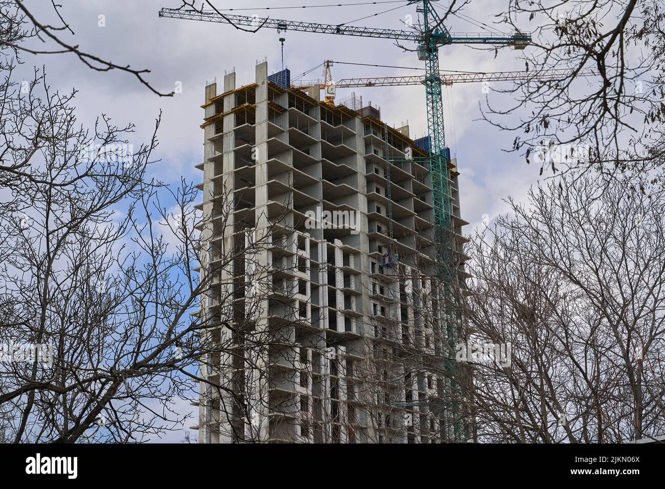 Construction site. High rise Building under construction. Construction ...