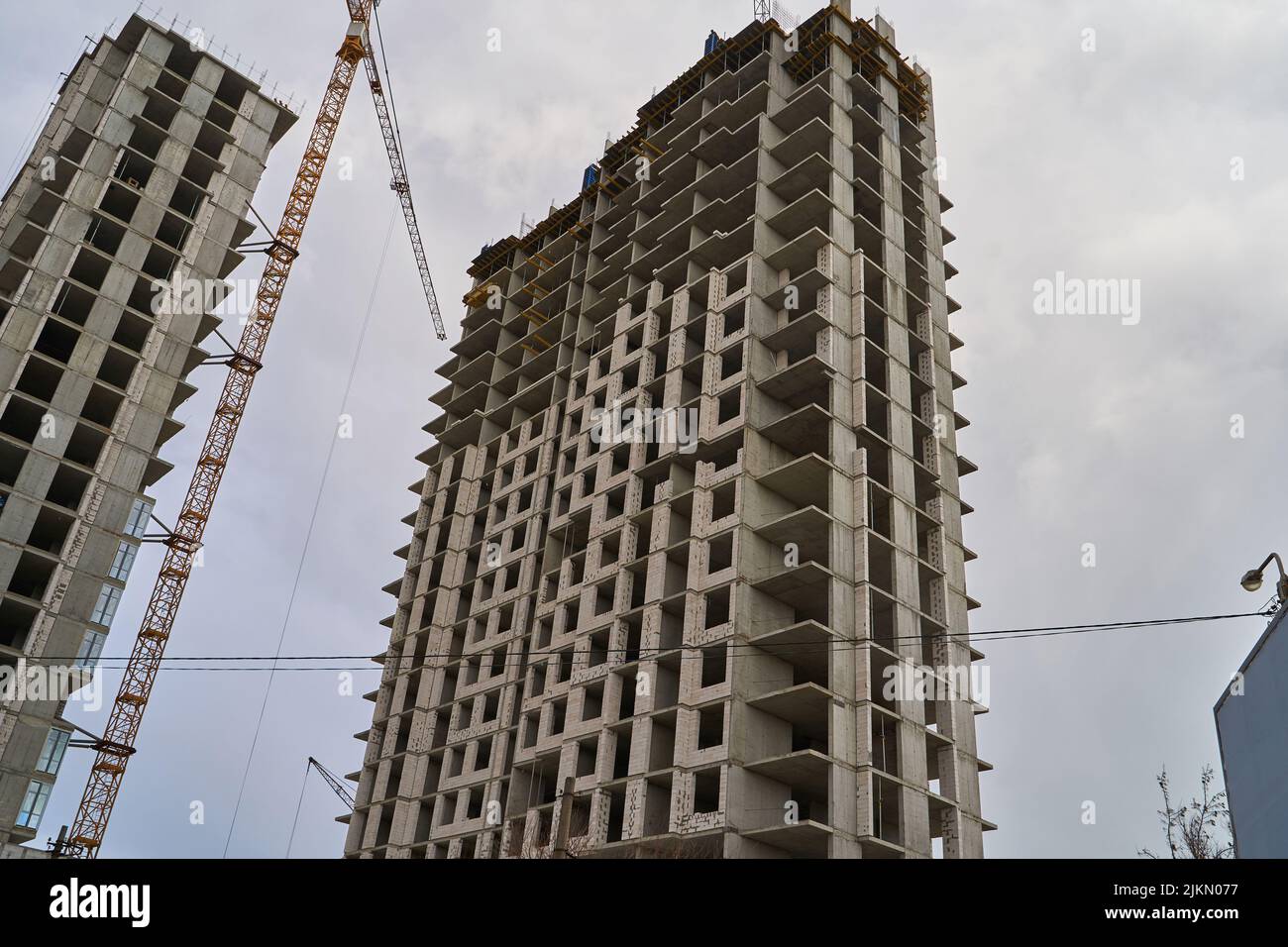Construction site. High rise Building under construction. Construction ...