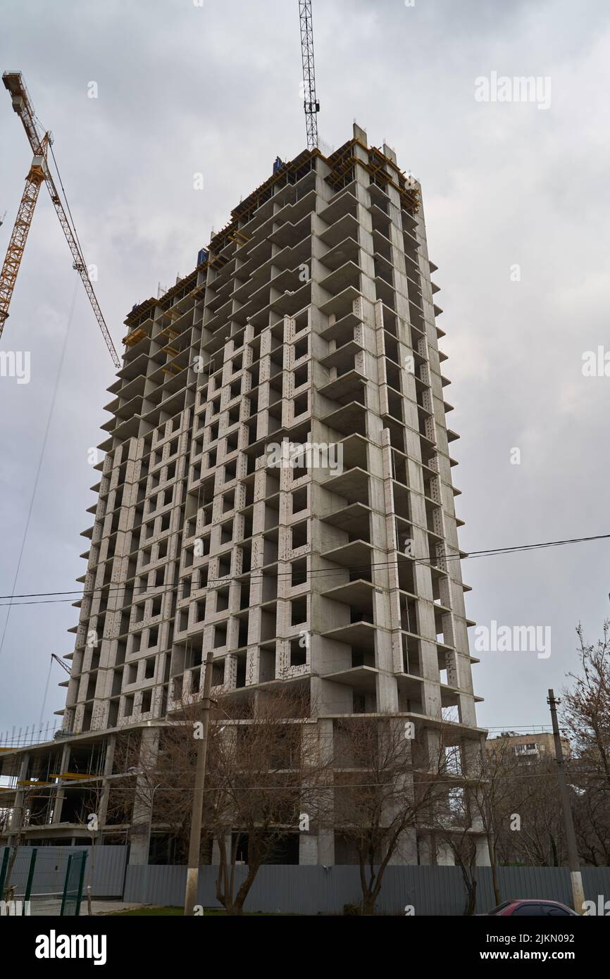 Construction site. High rise Building under construction. Construction ...