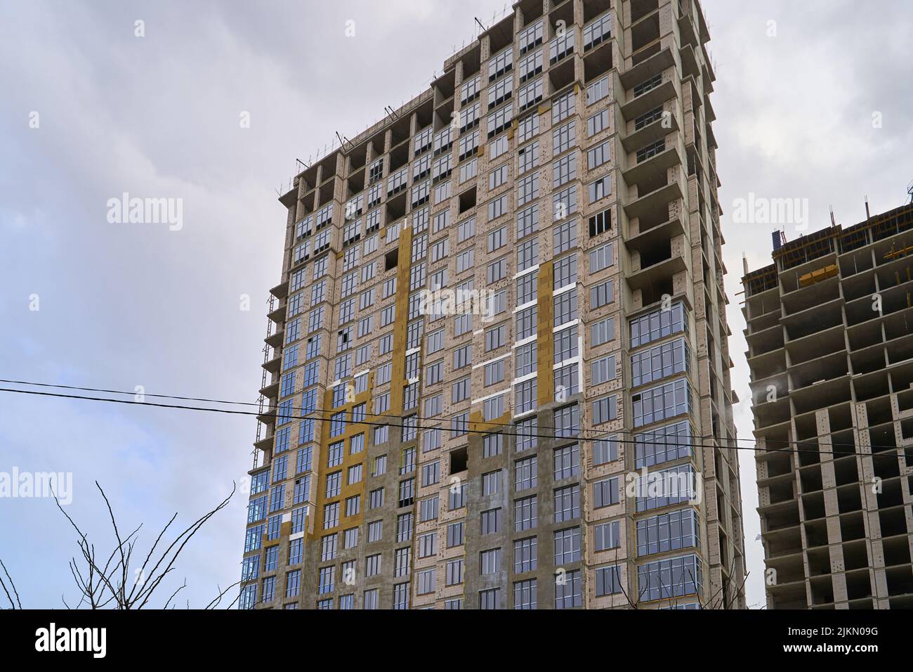 Construction site. High rise Building under construction. Construction ...