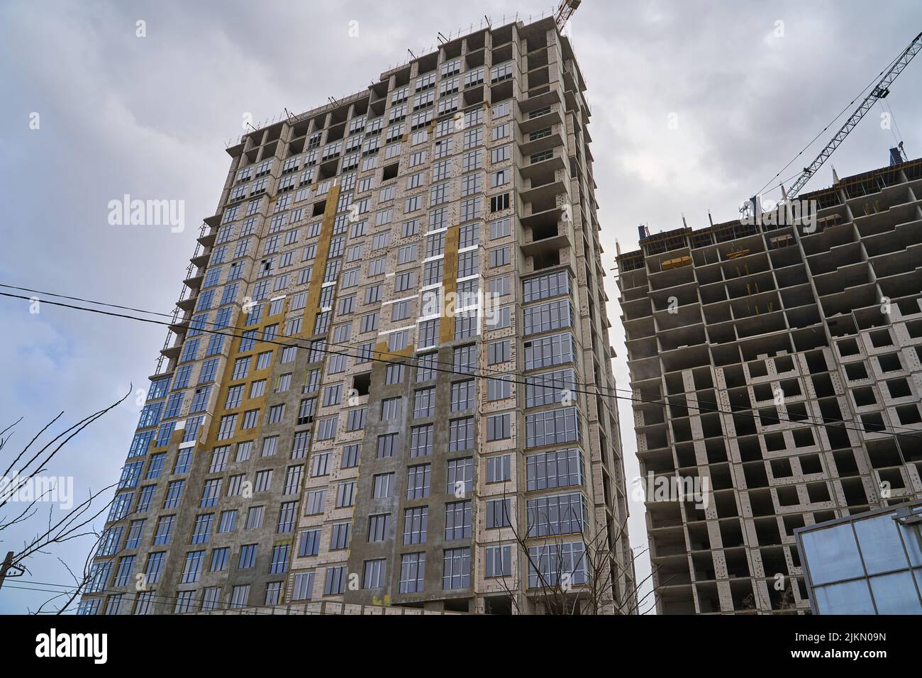 Construction site. High rise Building under construction. Construction ...