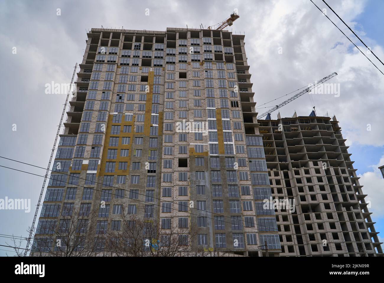 Construction site. High rise Building under construction. Construction ...