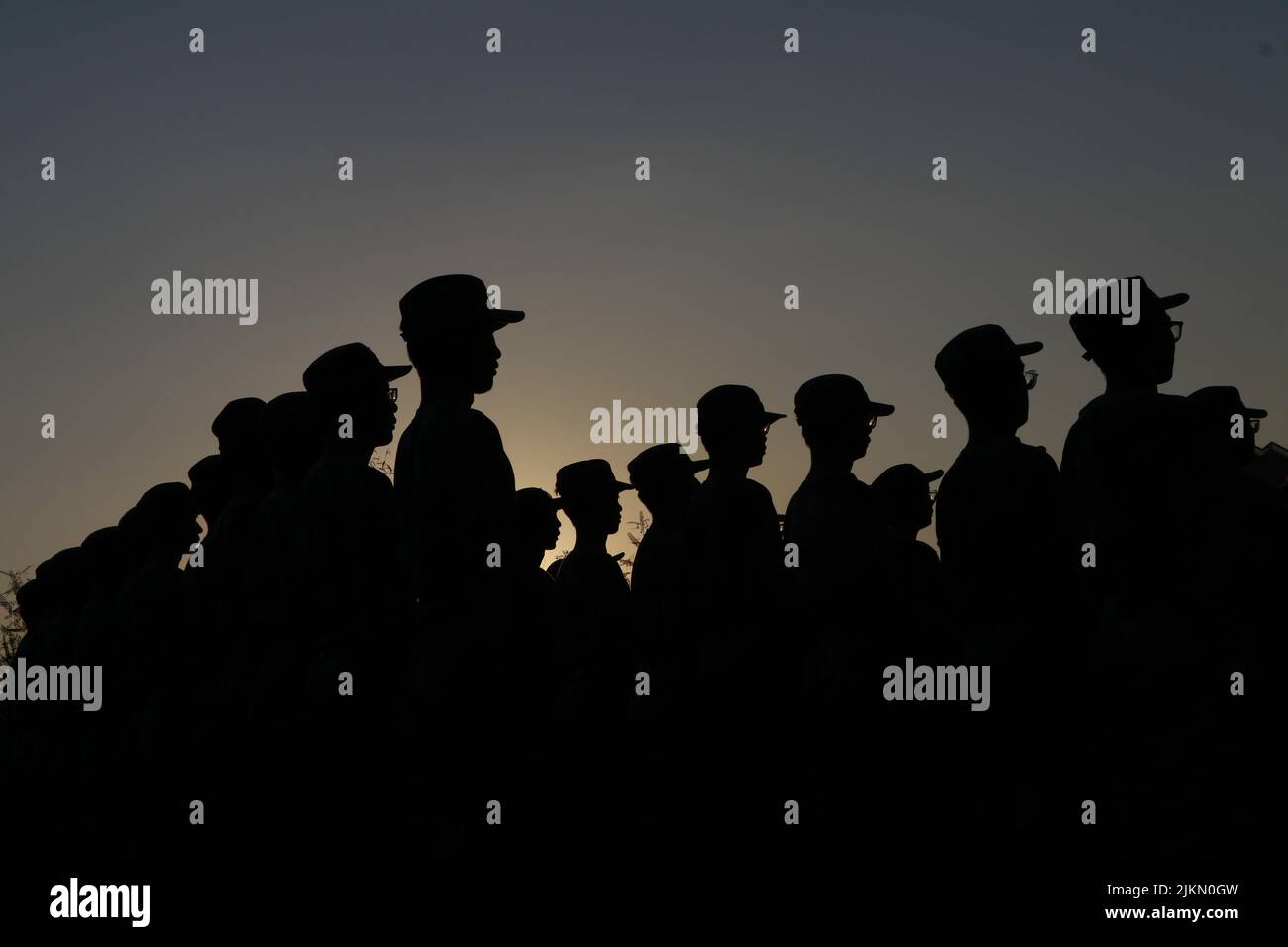 The silhouettes of rows of soldiers at dawn Stock Photo - Alamy