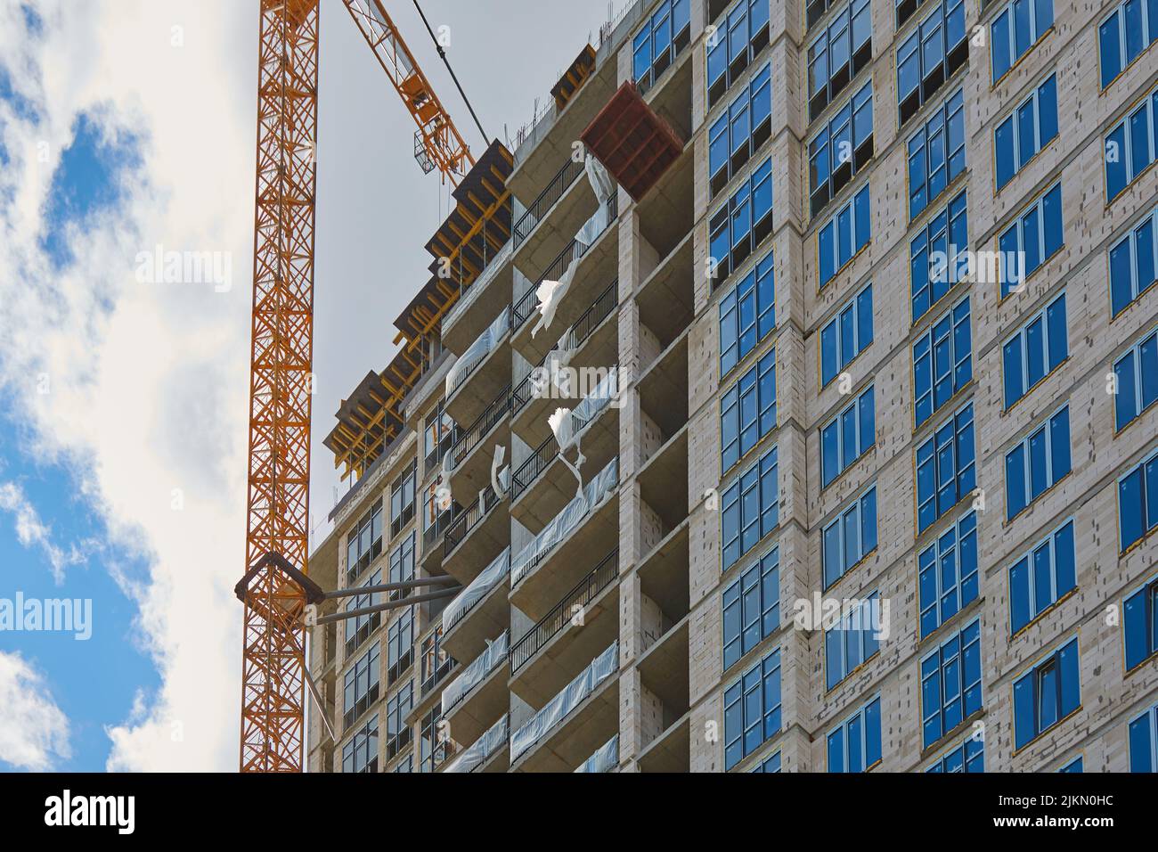 Construction site. High rise Building under construction. Construction ...