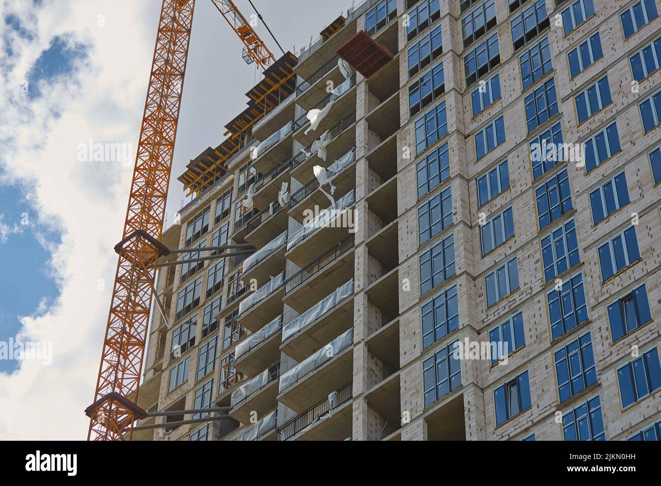 Construction site. High rise Building under construction. Construction ...