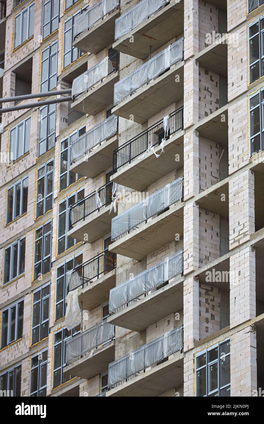 Construction site. High rise Building under construction. Construction ...