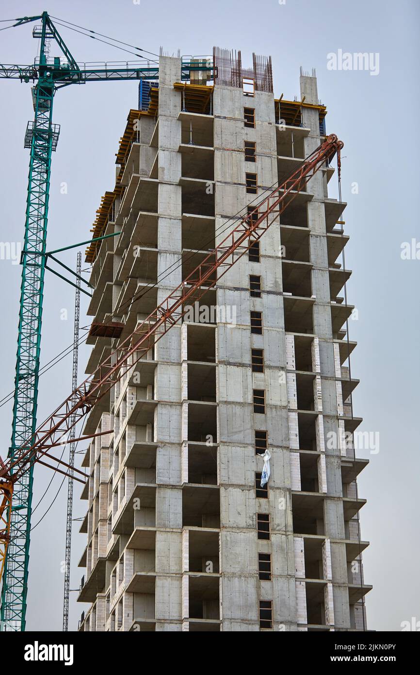 Construction site. High rise Building under construction. Construction ...