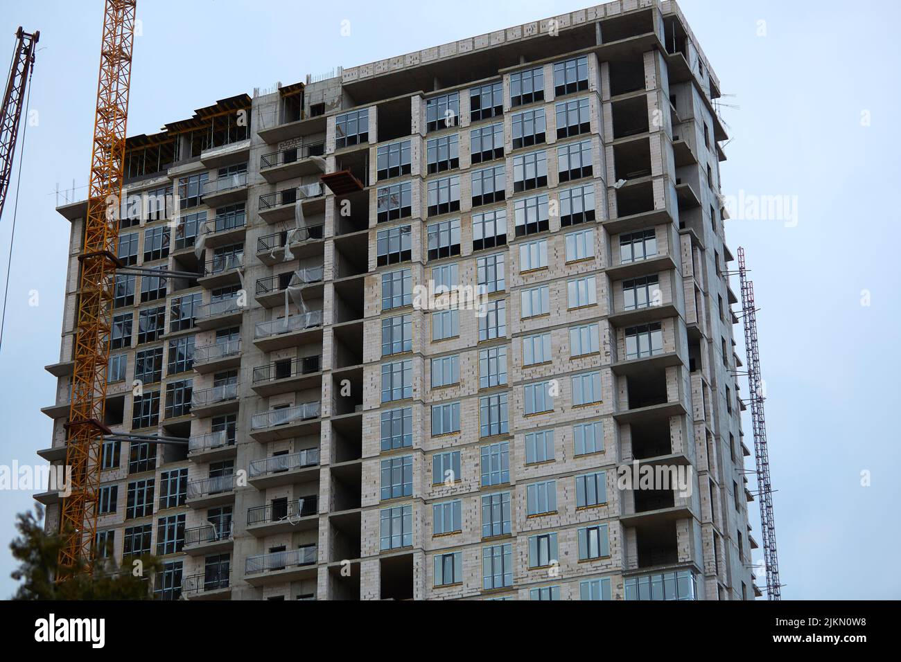 Construction site. High rise Building under construction. Construction ...
