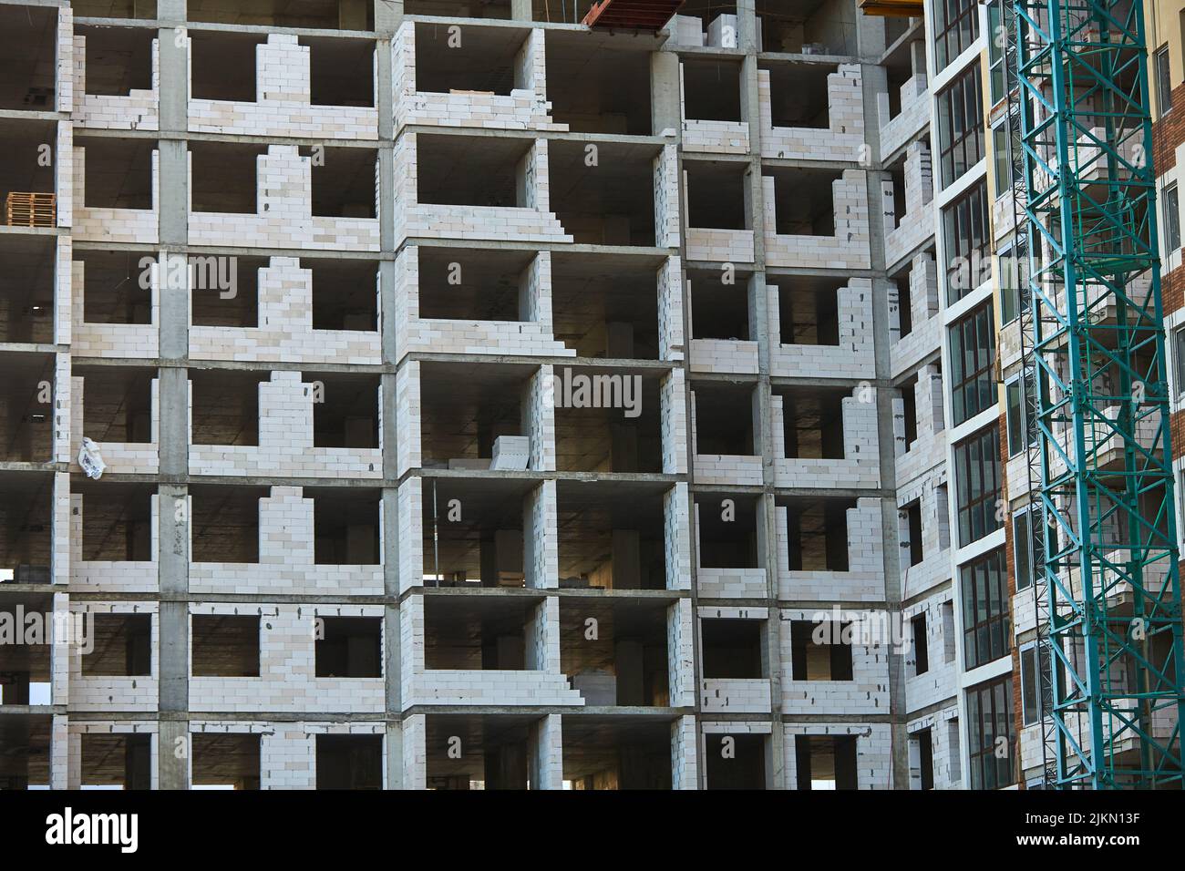 Construction site. High rise Building under construction. Construction ...