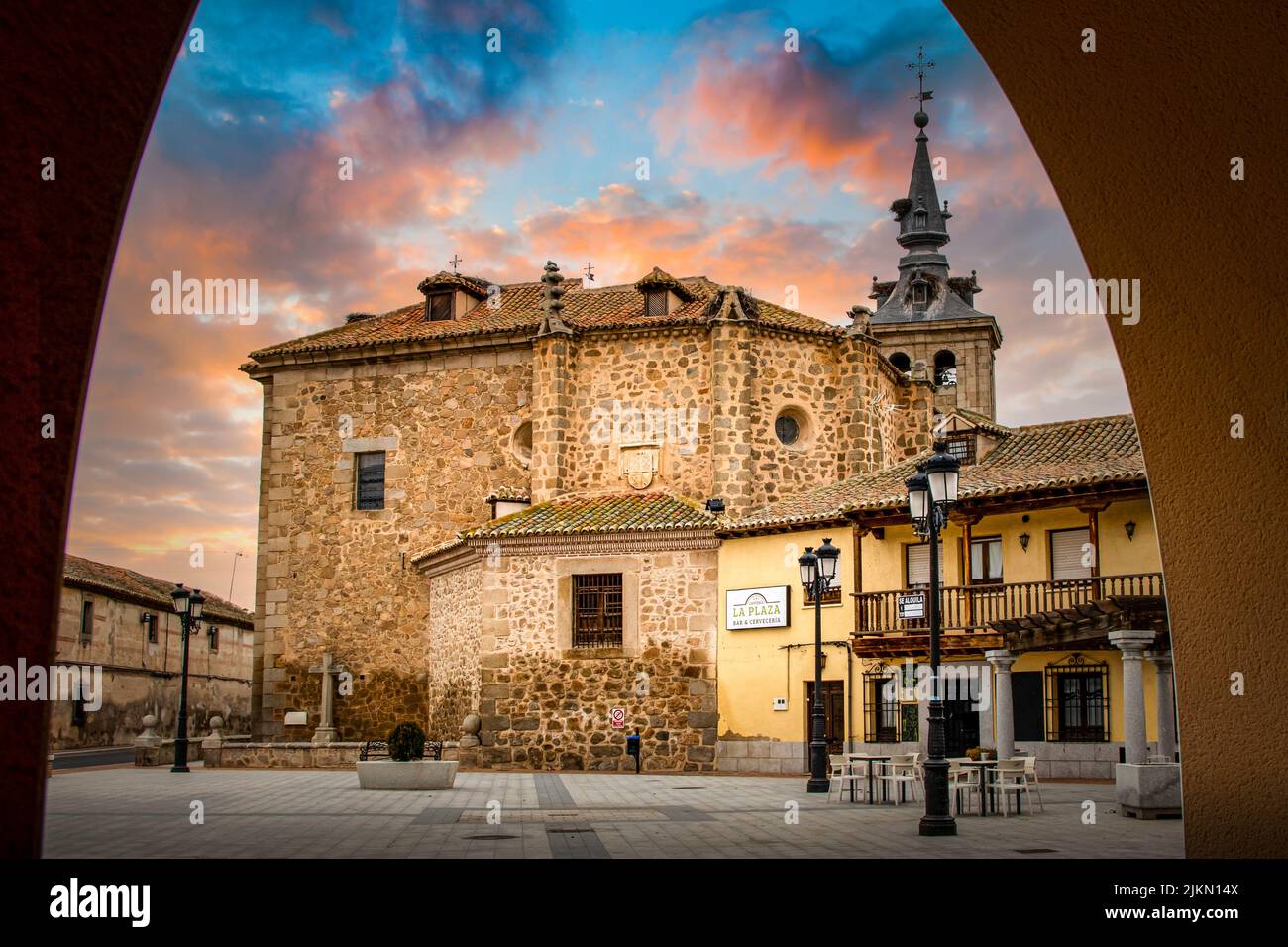 A view of plaza de la iglesia de cuerva in Spain at beautiful sunset ...
