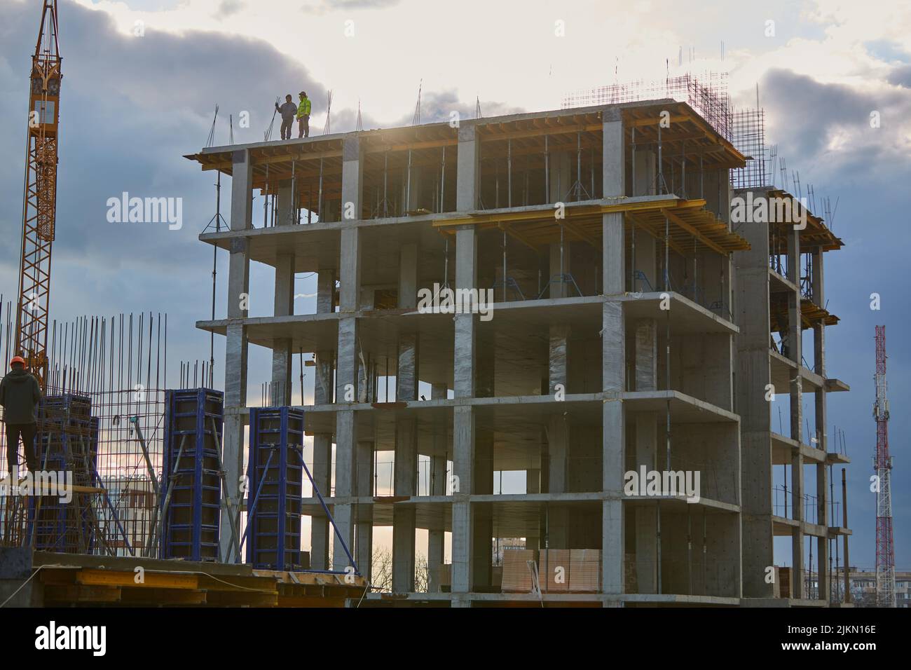 Construction site. High rise Building under construction. Construction ...