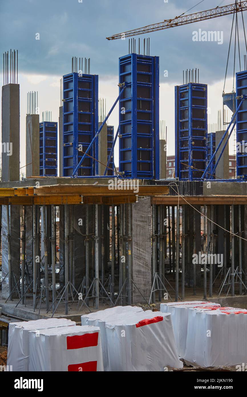 Construction site. High rise Building under construction. Construction ...