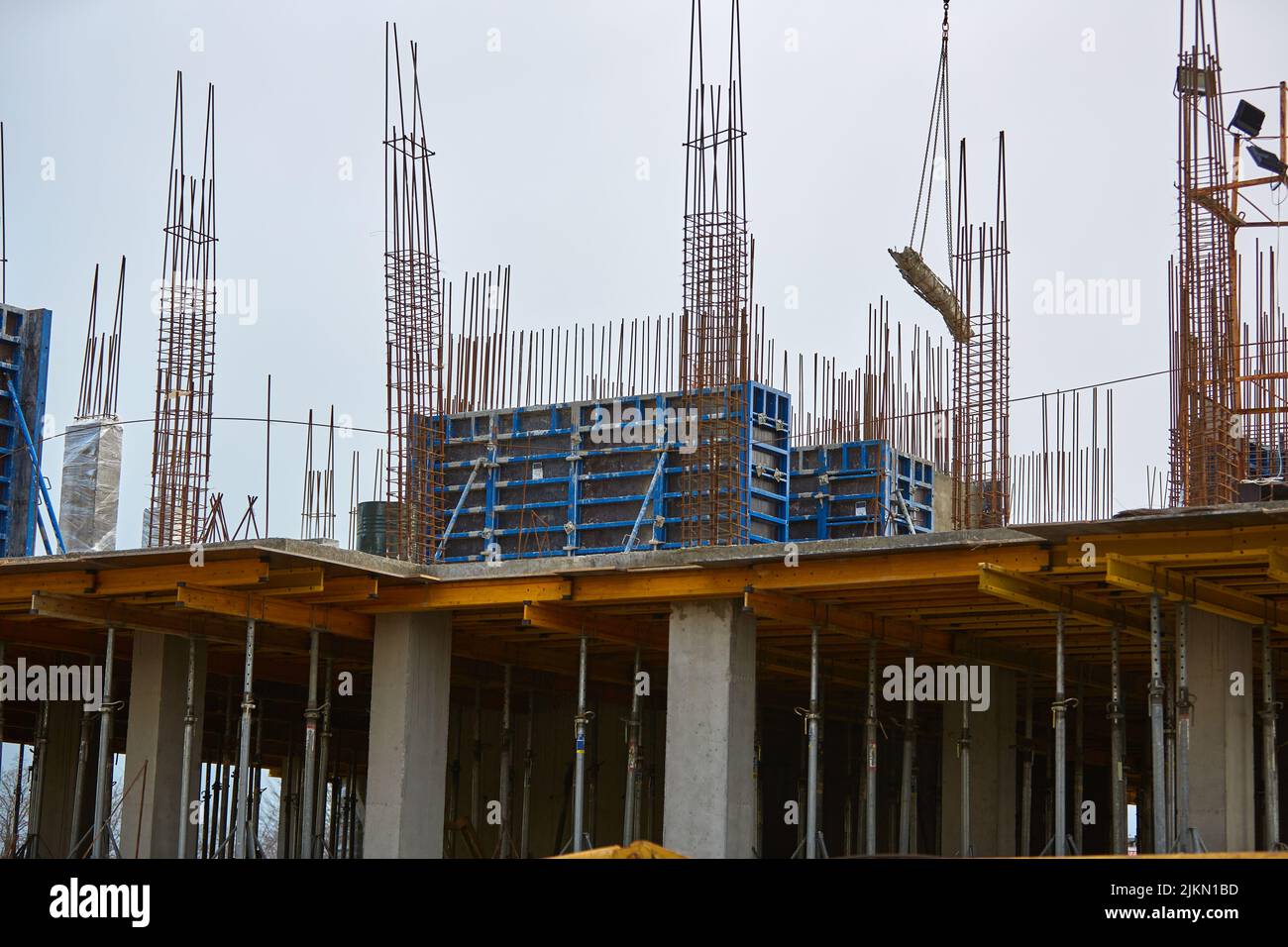 Construction site. High rise Building under construction. Construction ...