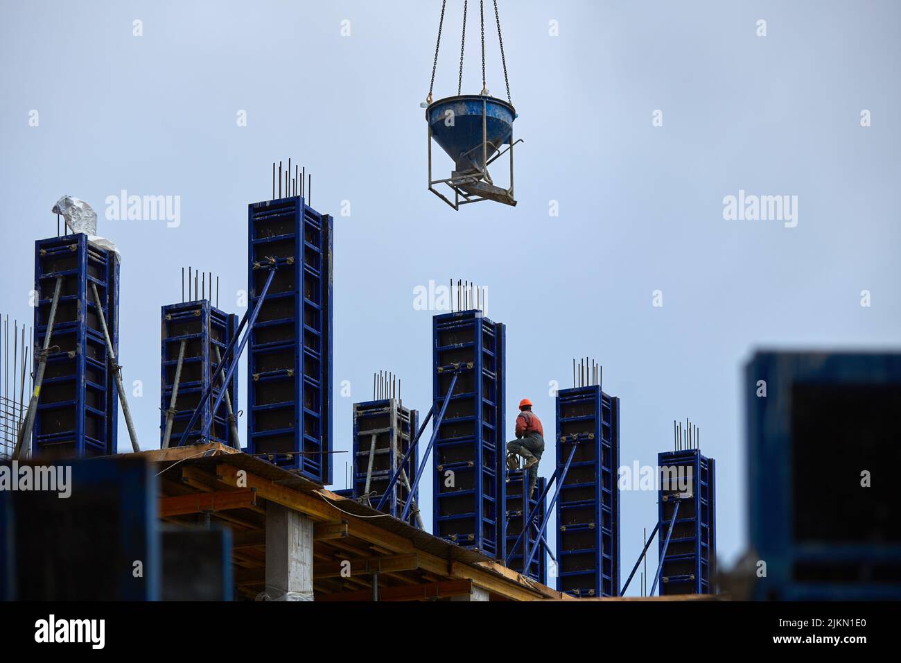 Pouring concrete on the construction of a high-rise building Stock ...