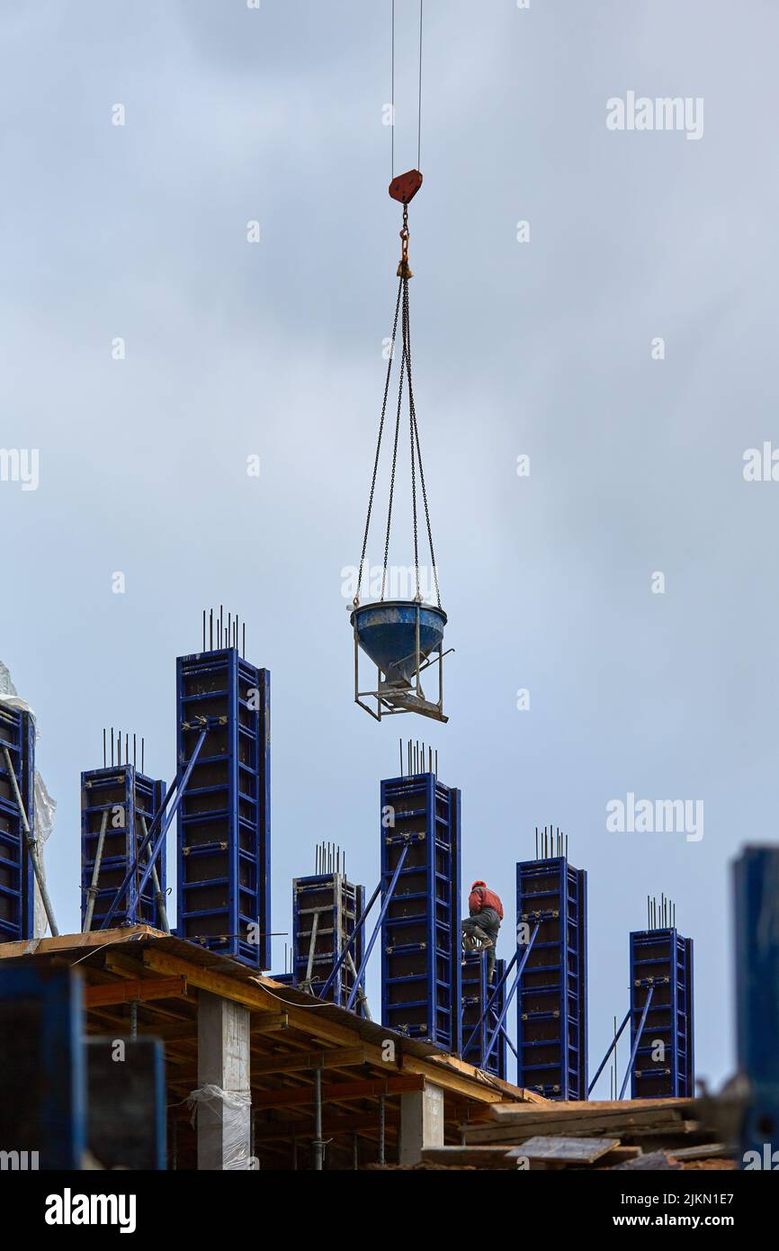 Pouring concrete on the construction of a high-rise building Stock ...