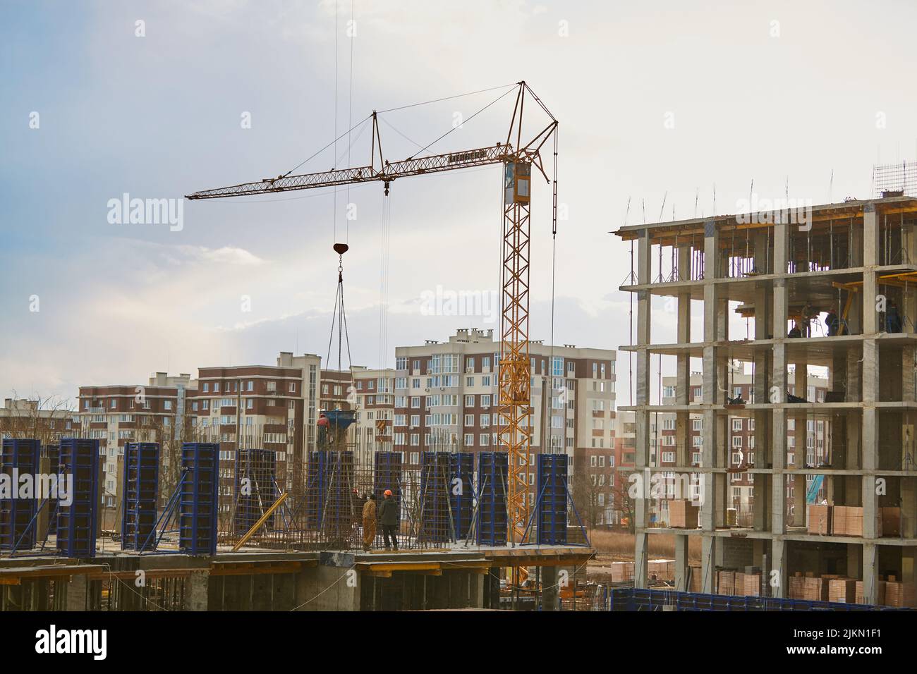 Construction site. High rise Building under construction. Construction ...