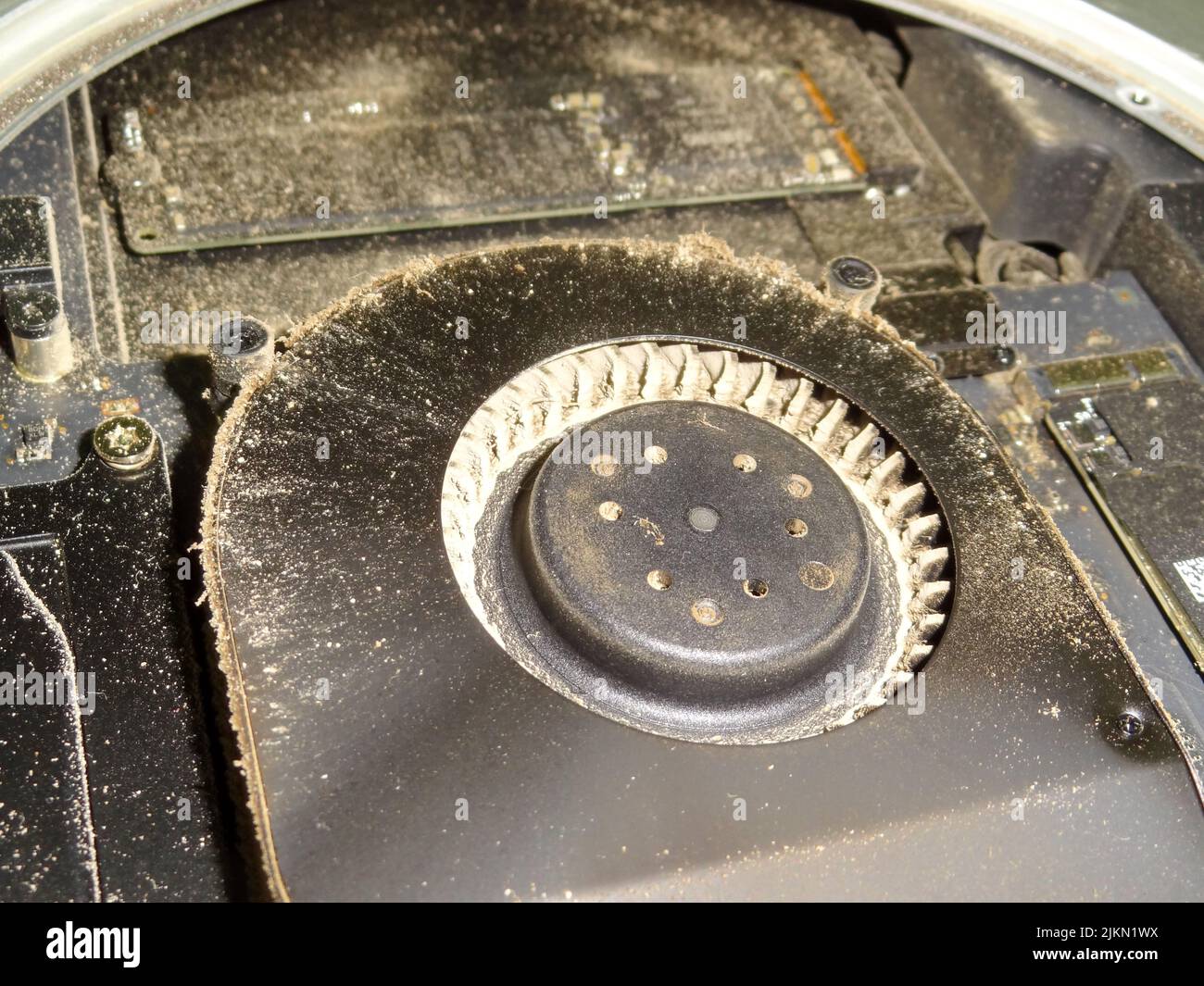 A mini mac inside dust after years of heavy use Stock Photo - Alamy