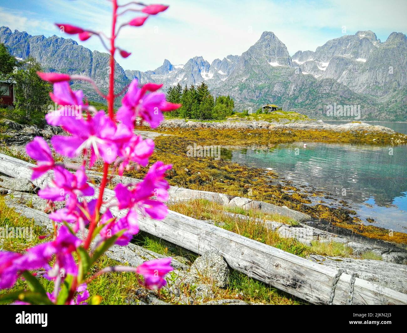 A natural landscape scenery of a lake at the foot of mountains from the ...