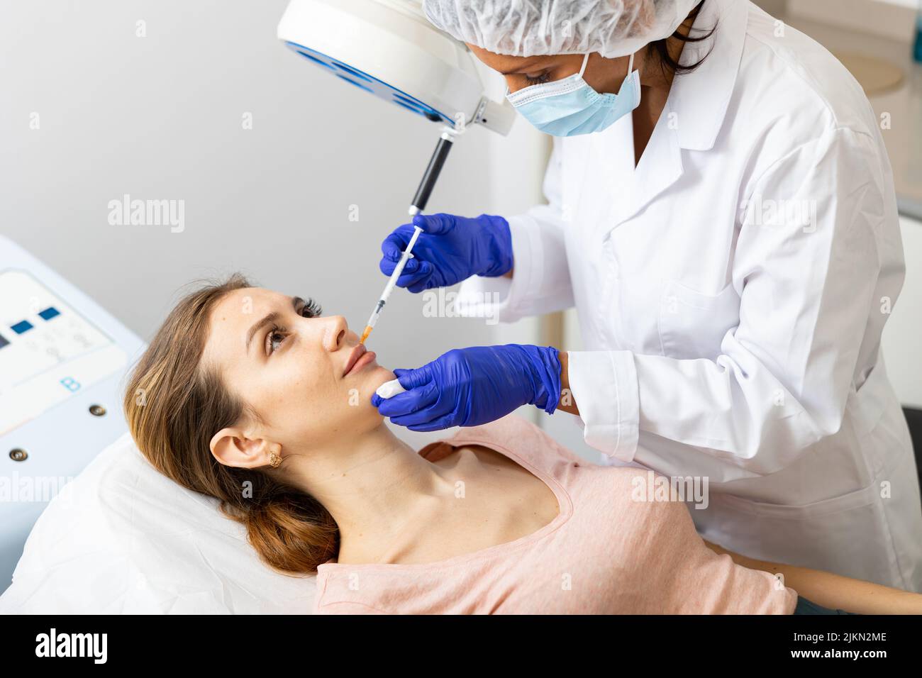 Beautician making face injections hi-res stock photography and images - Alamy
