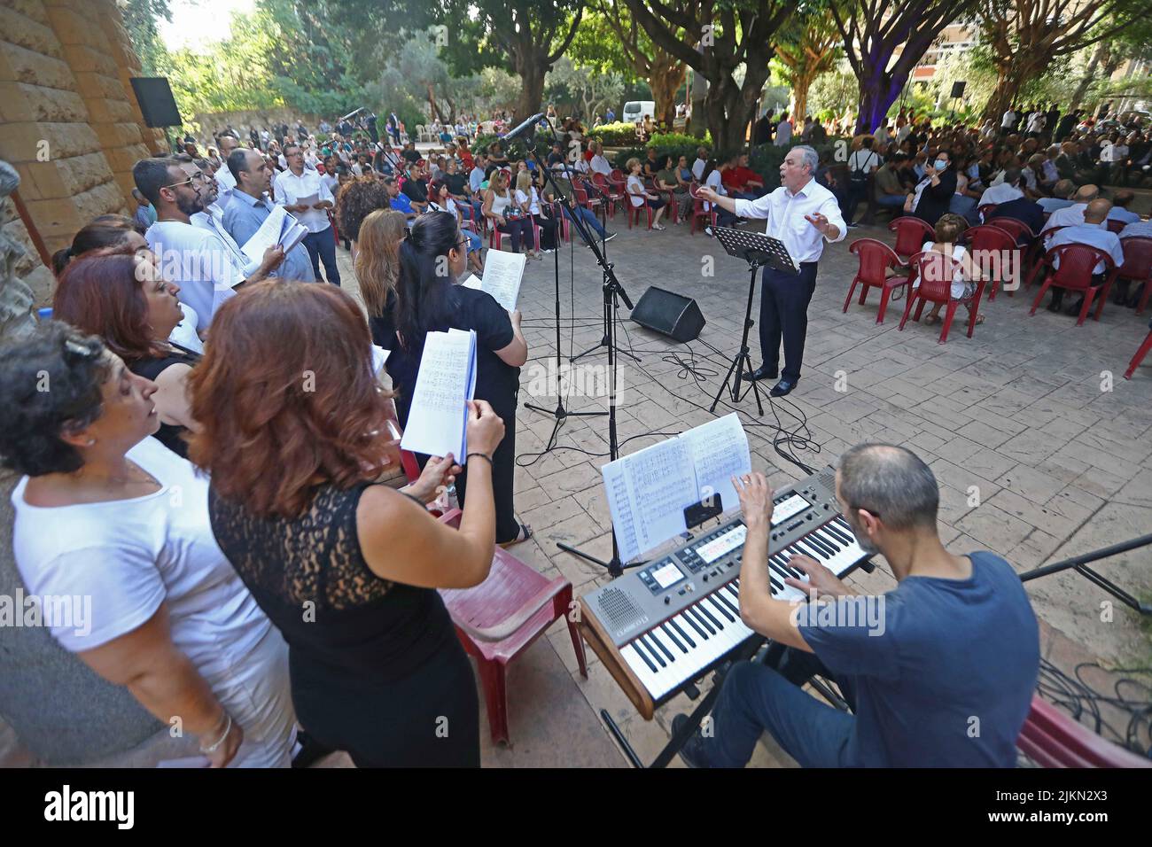 Beirut, Lebanon. 2nd Aug, 2022. People participate in a memorial ...