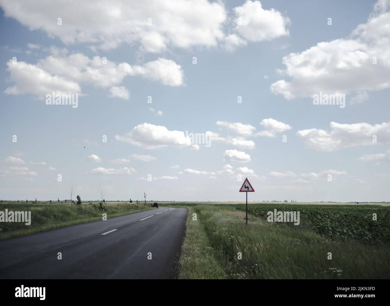 Road sign dangerous turns hi-res stock photography and images - Alamy