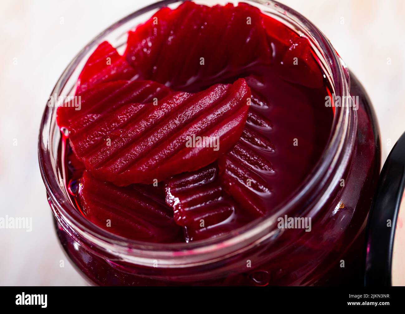 Glass jar with pickled red beets Stock Photo - Alamy