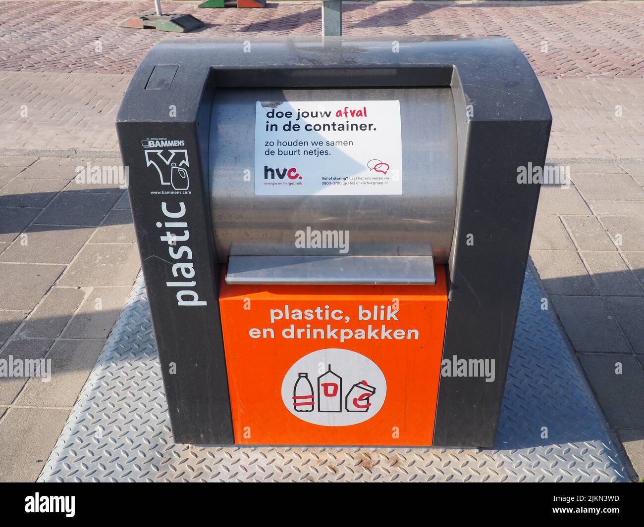 A semi-underground container for collecting plastic packages for ...